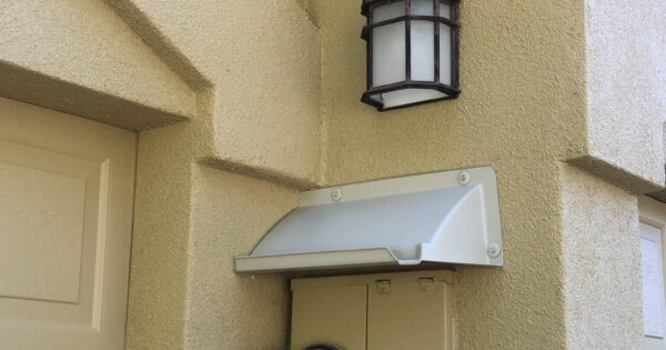 Electric meter box cover stops leaks