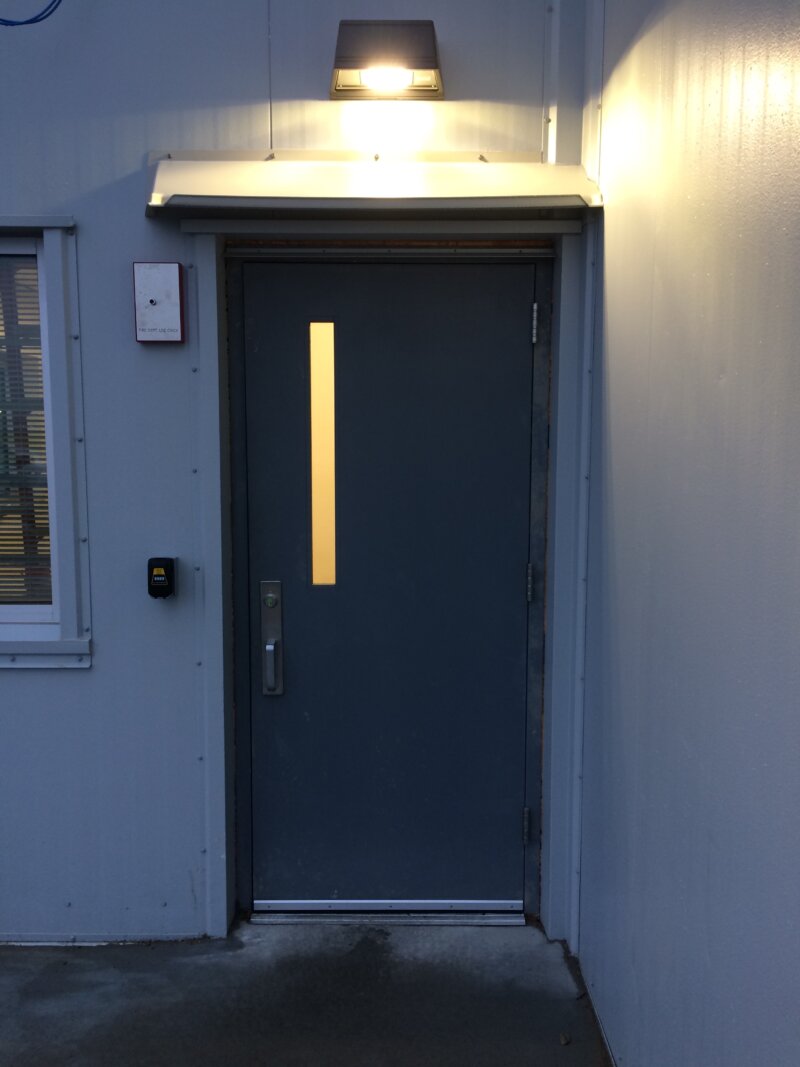 Steel building door or window visor or flashing stops leaks.
